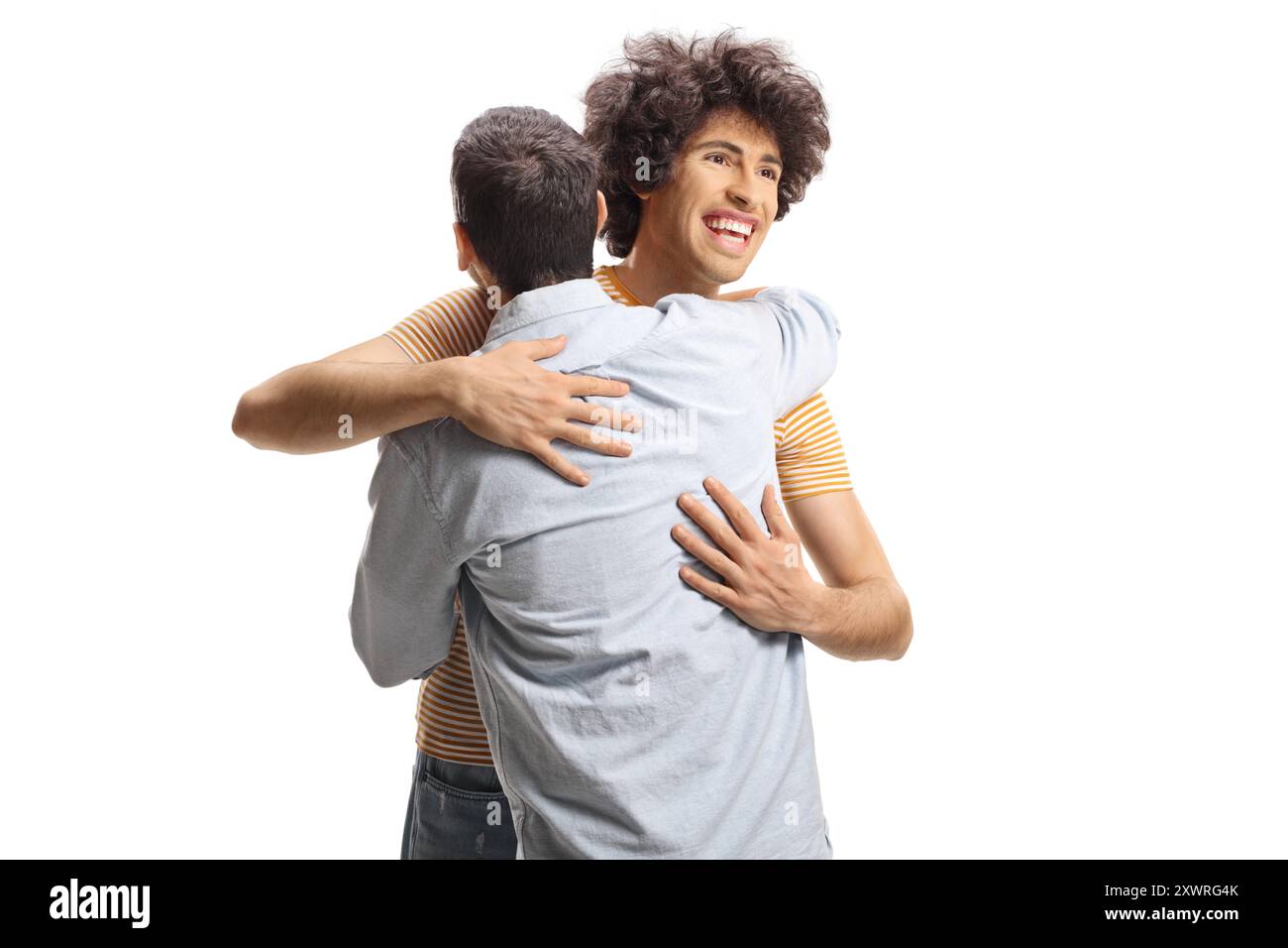 Happy young men in embrace isolated on white background Stock Photo - Alamy