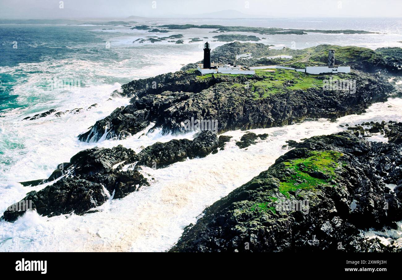Stormy Atlantic weather. Slyne Head lighthouse marks the treacherous ...