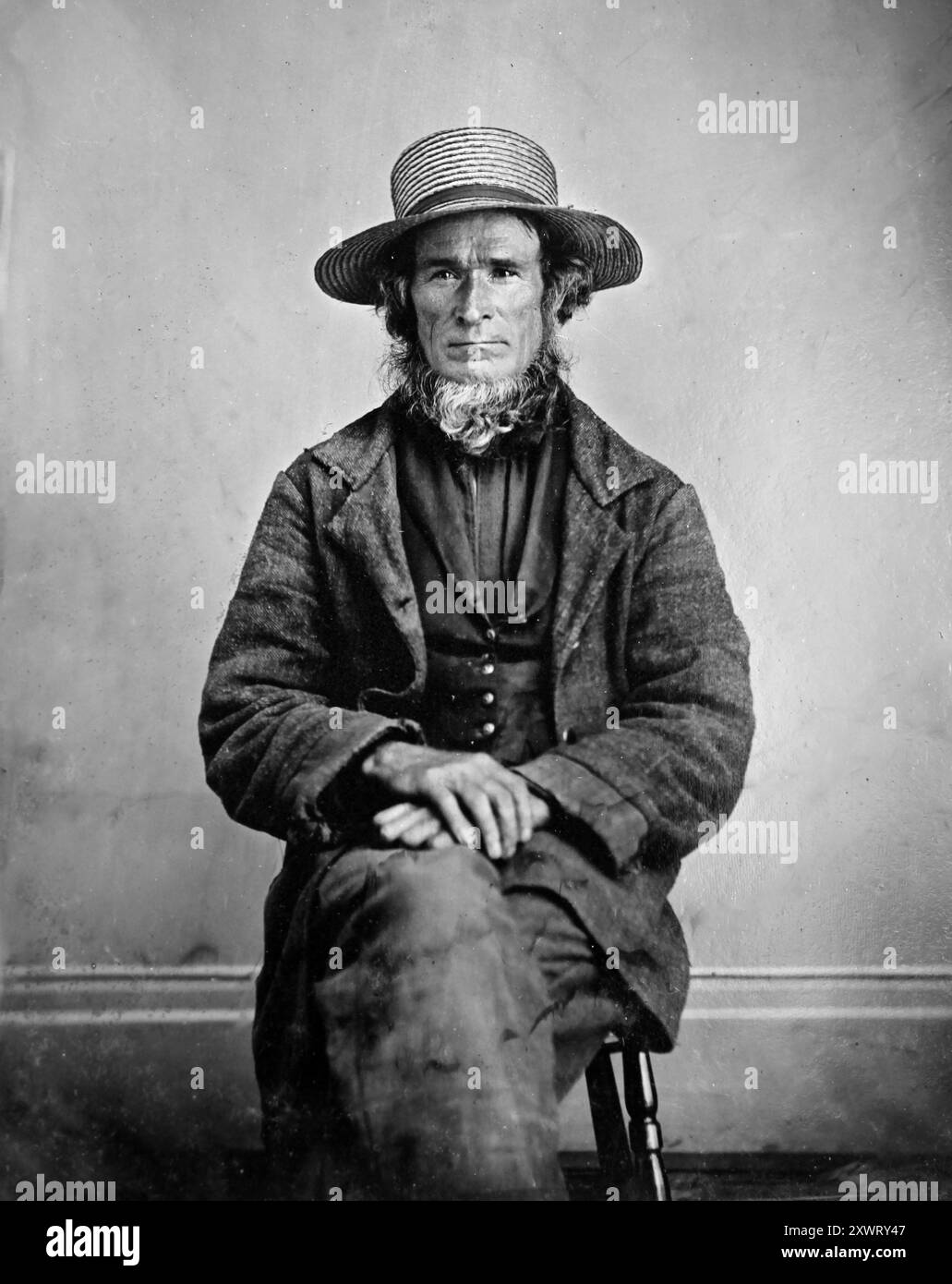 A simple farmer sits for tintype portrait, ca. 1880 Stock Photo - Alamy
