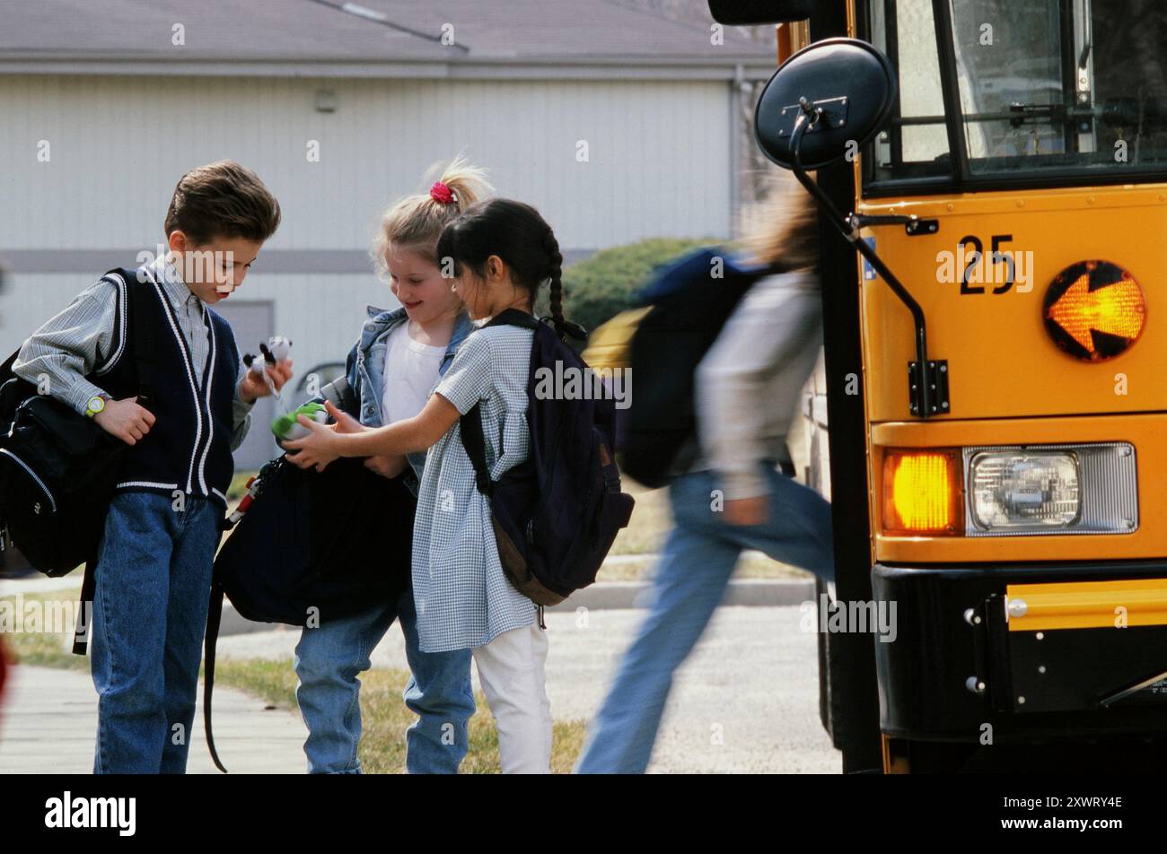 Children talking school bus hi-res stock photography and images - Alamy