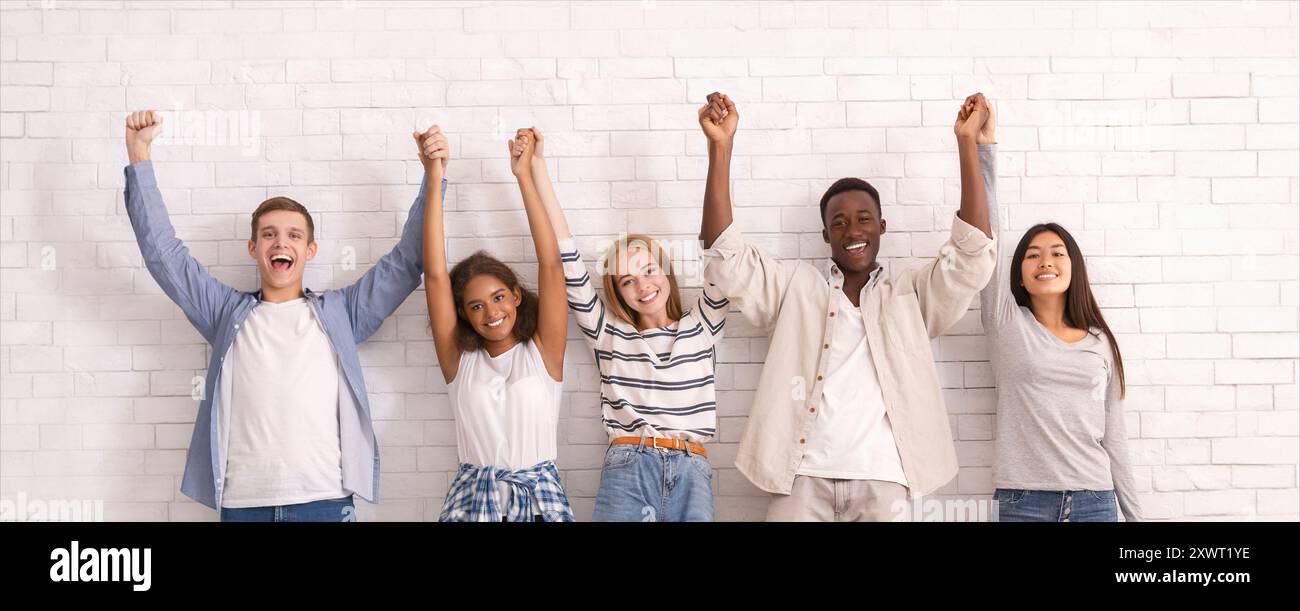 Diverse teens hands together hi-res stock photography and images - Alamy