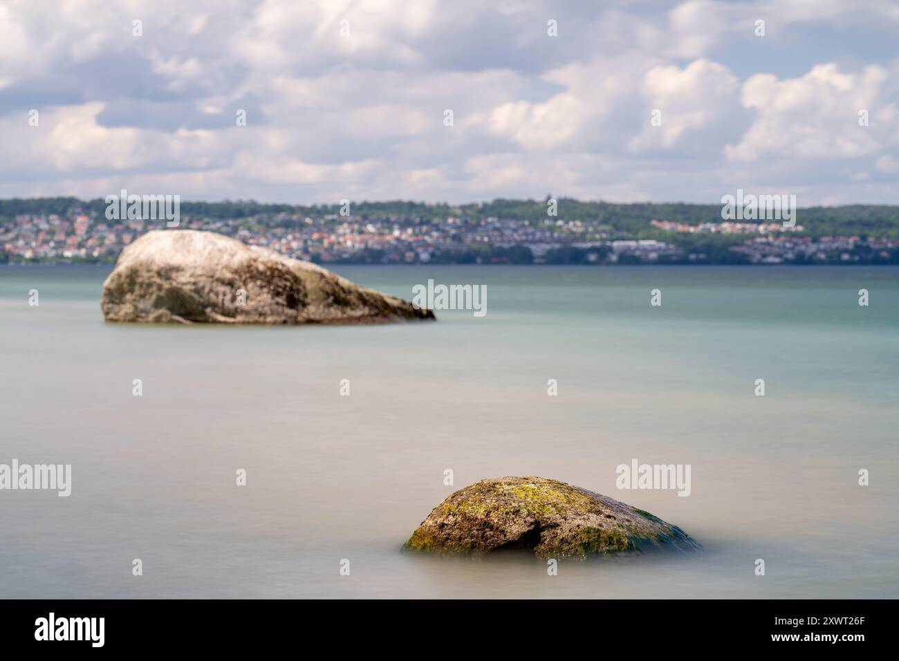 Two smooth stones emerge hi-res stock photography and images - Alamy