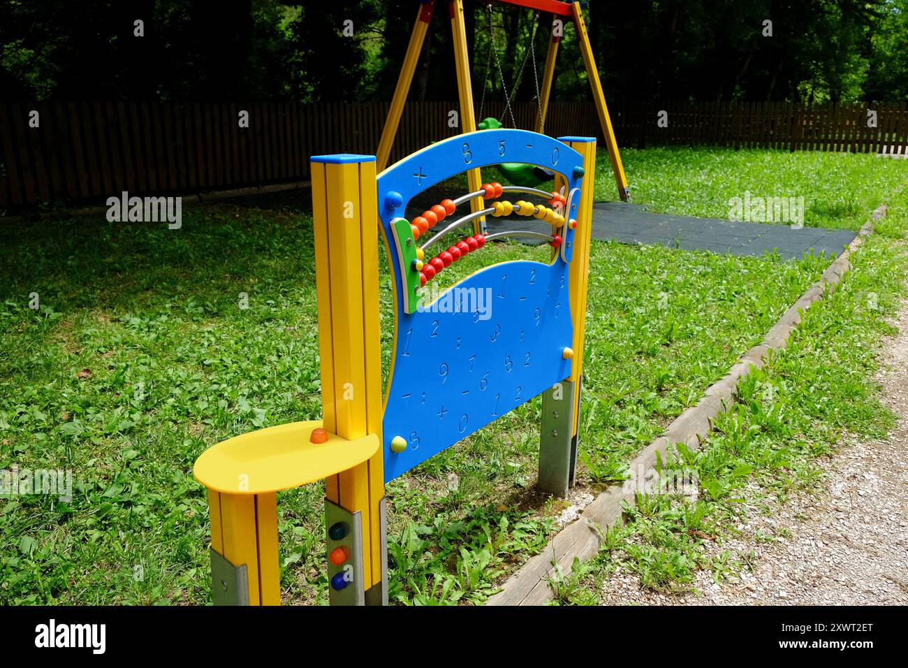 Playground equipment with abacus in park at summer Stock Photo - Alamy