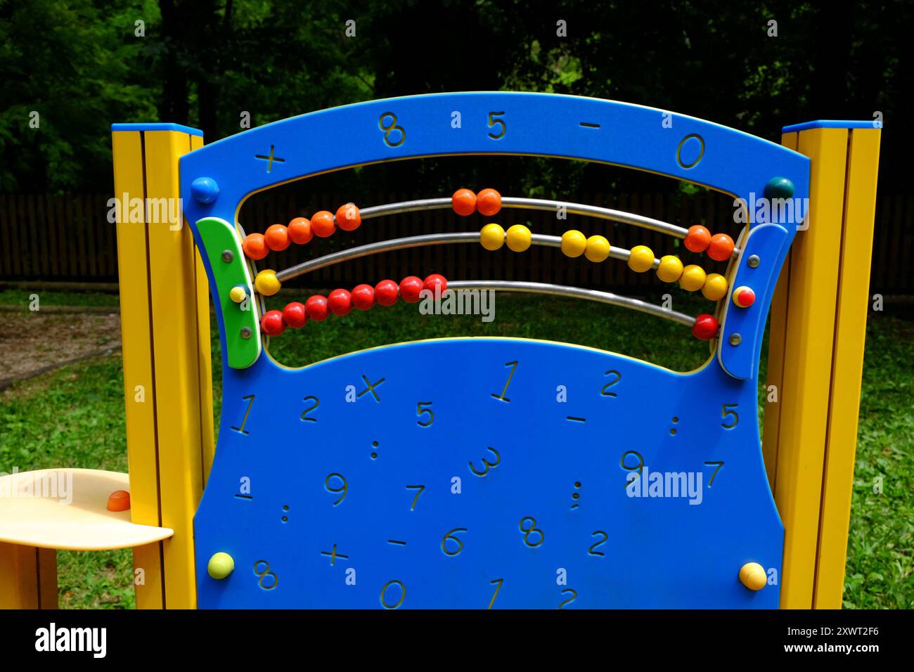 Playground equipment with abacus in park at summer Stock Photo - Alamy