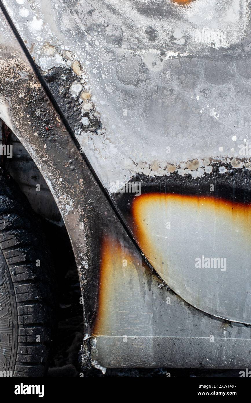 Detailed view of a burnt car damaged during riots in Frankfurt. The ...