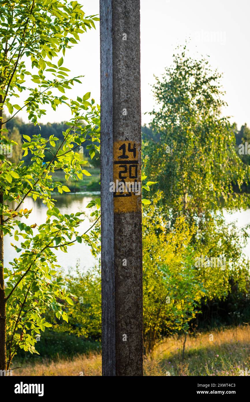 Shot of the marking on electric pillar Stock Photo - Alamy