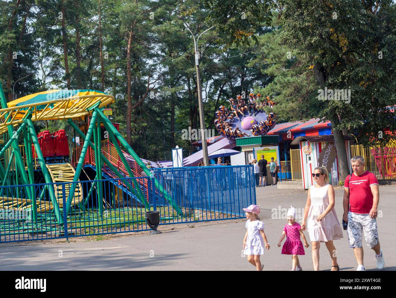 Shot of the attraction in the amusement park Stock Photo - Alamy