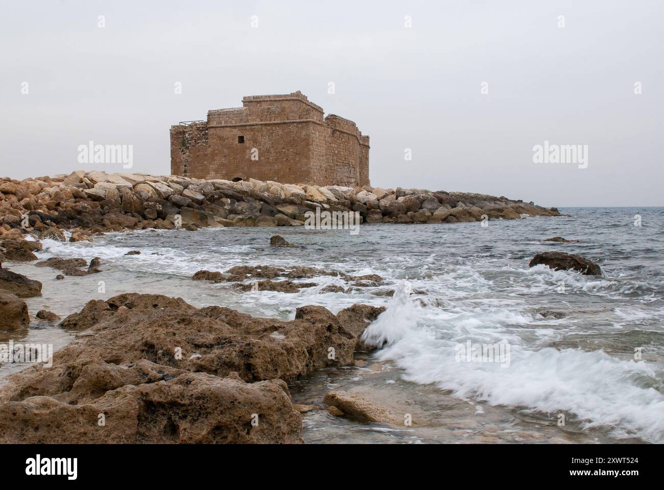 Paphos castle at down. Coastal ancient historic castle landmark at ...