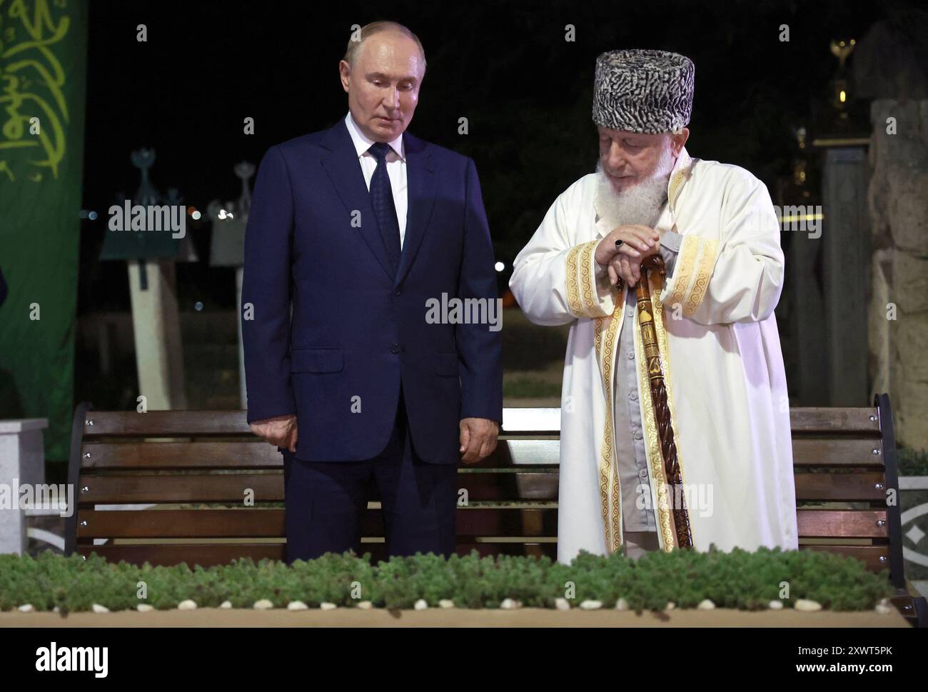 Russian President Vladimir Putin, left, and Akhmat Kadyrov's cousin ...