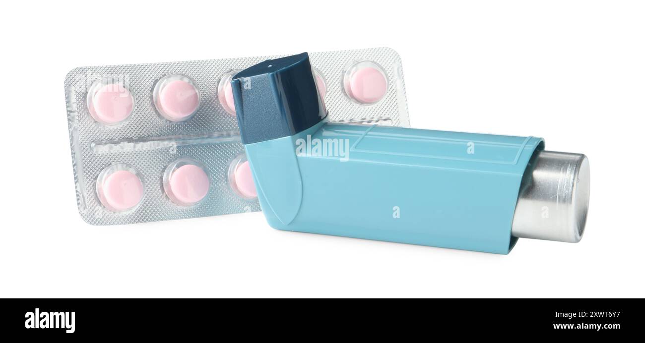 Asthma treatment. Inhaler and pills isolated on white Stock Photo - Alamy