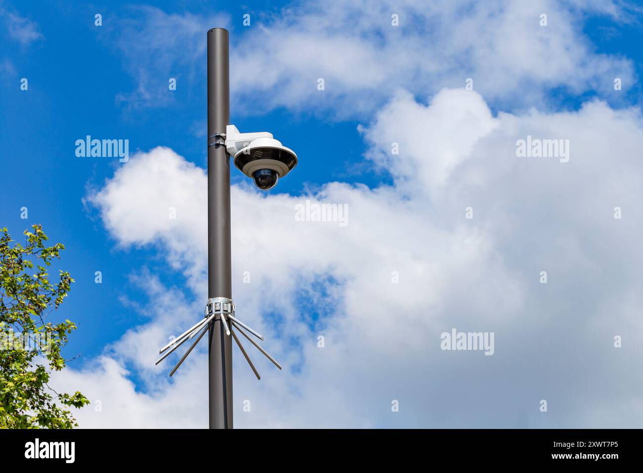 Security camera on a light pole on the street.Security camera and urban ...