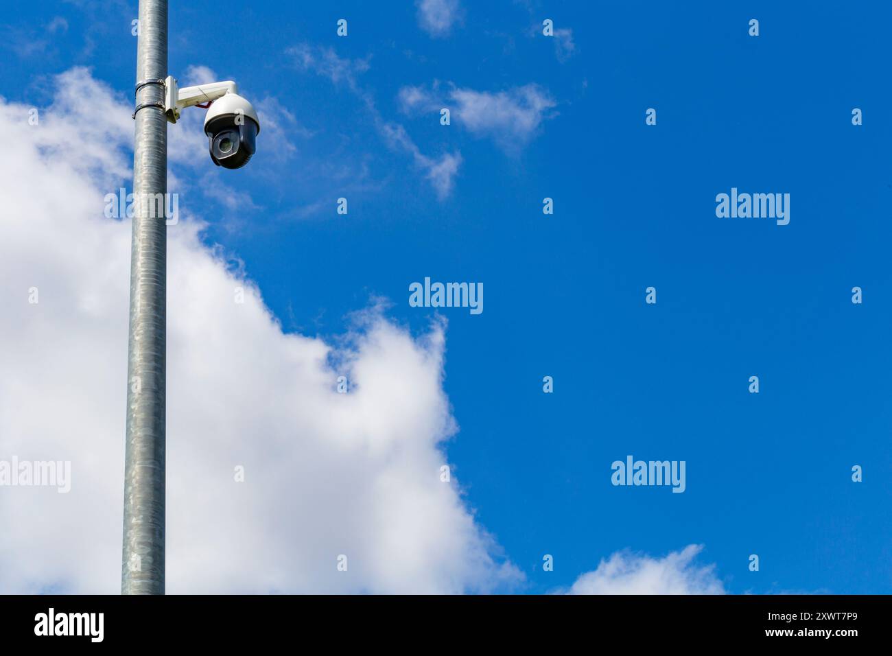 Security camera on a light pole on the street.Security camera and urban ...
