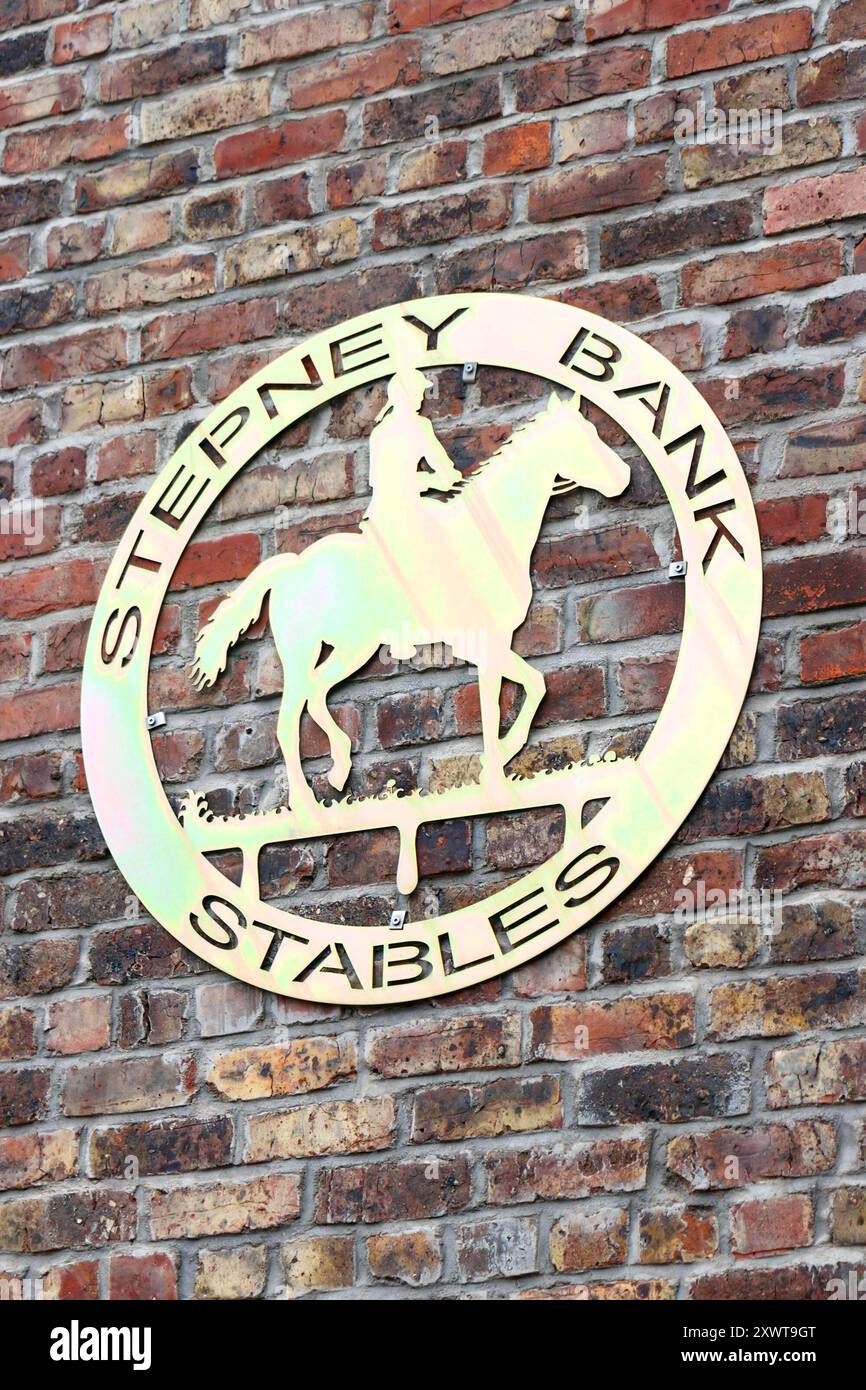 gold wall sign for stepney bank stables newcastle upon tyne Stock Photo ...