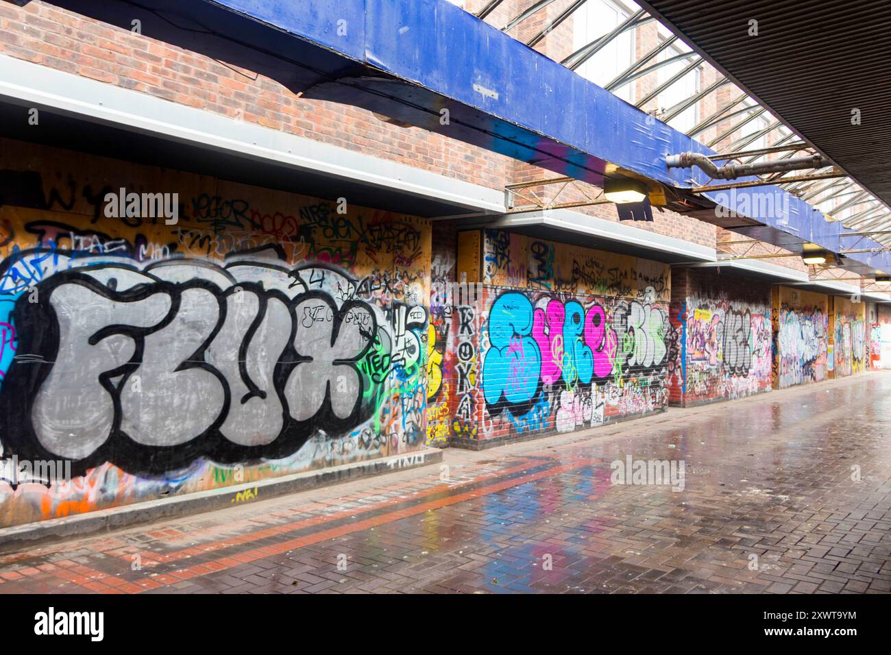 street art graffiti wall painting in abandoned shopping centre mall ...