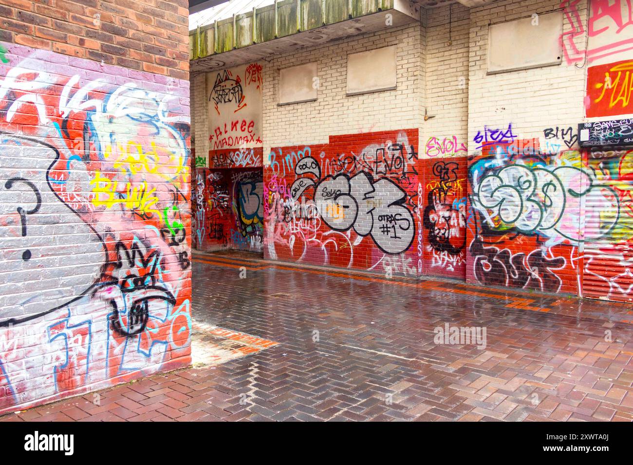 street art graffiti wall painting in abandoned shopping centre mall ...