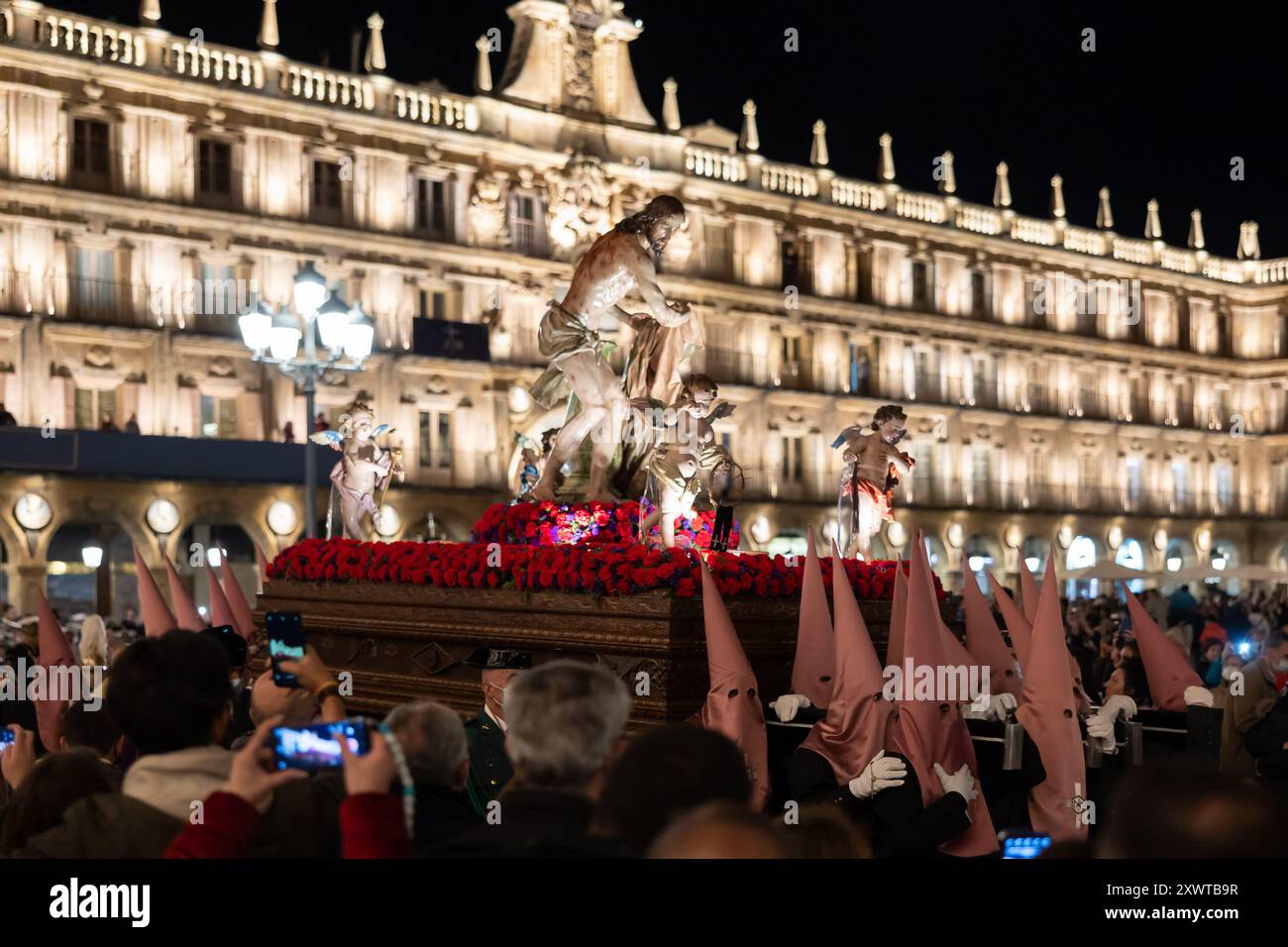 Religious brotherhood carrying paso of Flagellated Jesus during Holy ...