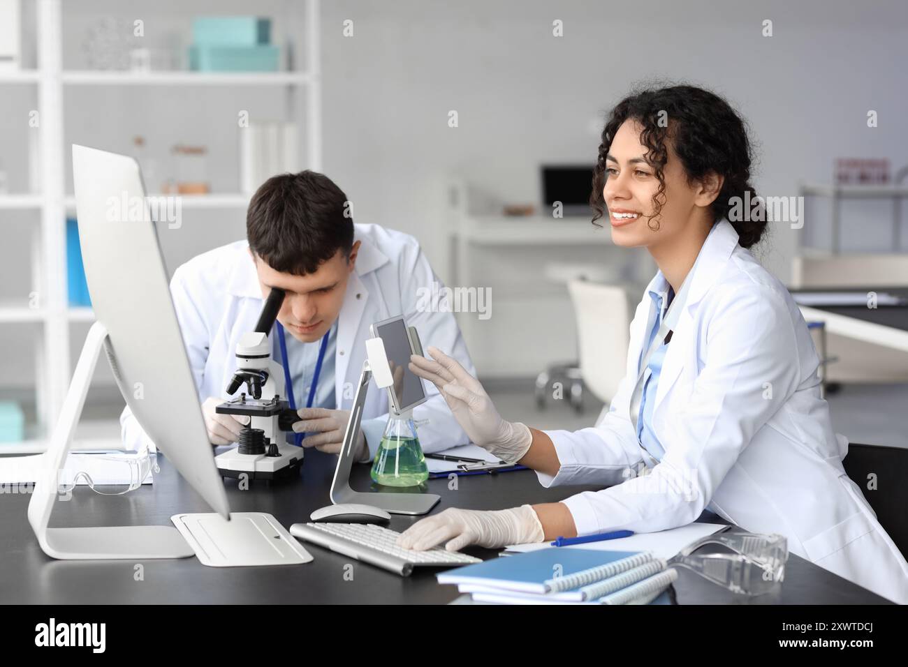 Chemists in modern professional laboratory hi-res stock photography and ...