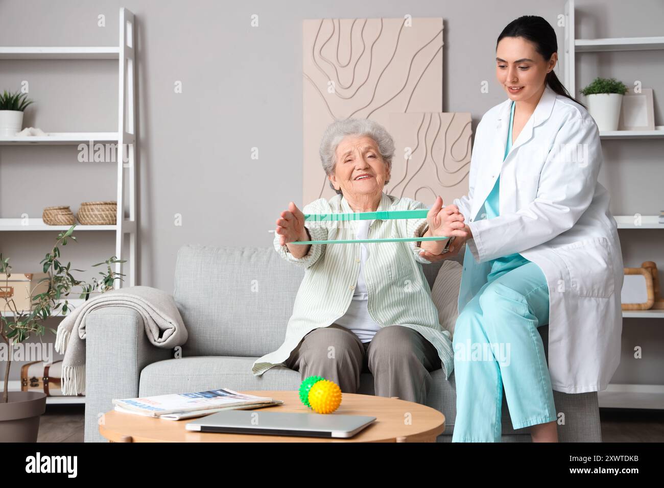 Physiotherapy help stretching band hi-res stock photography and images ...
