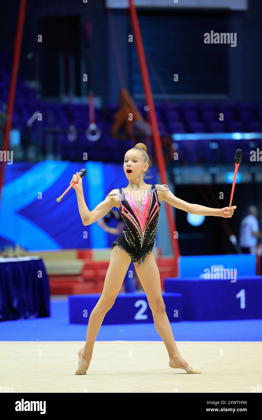 Youth gymnast excels in rhythmic gymnastics with talent, dedication ...