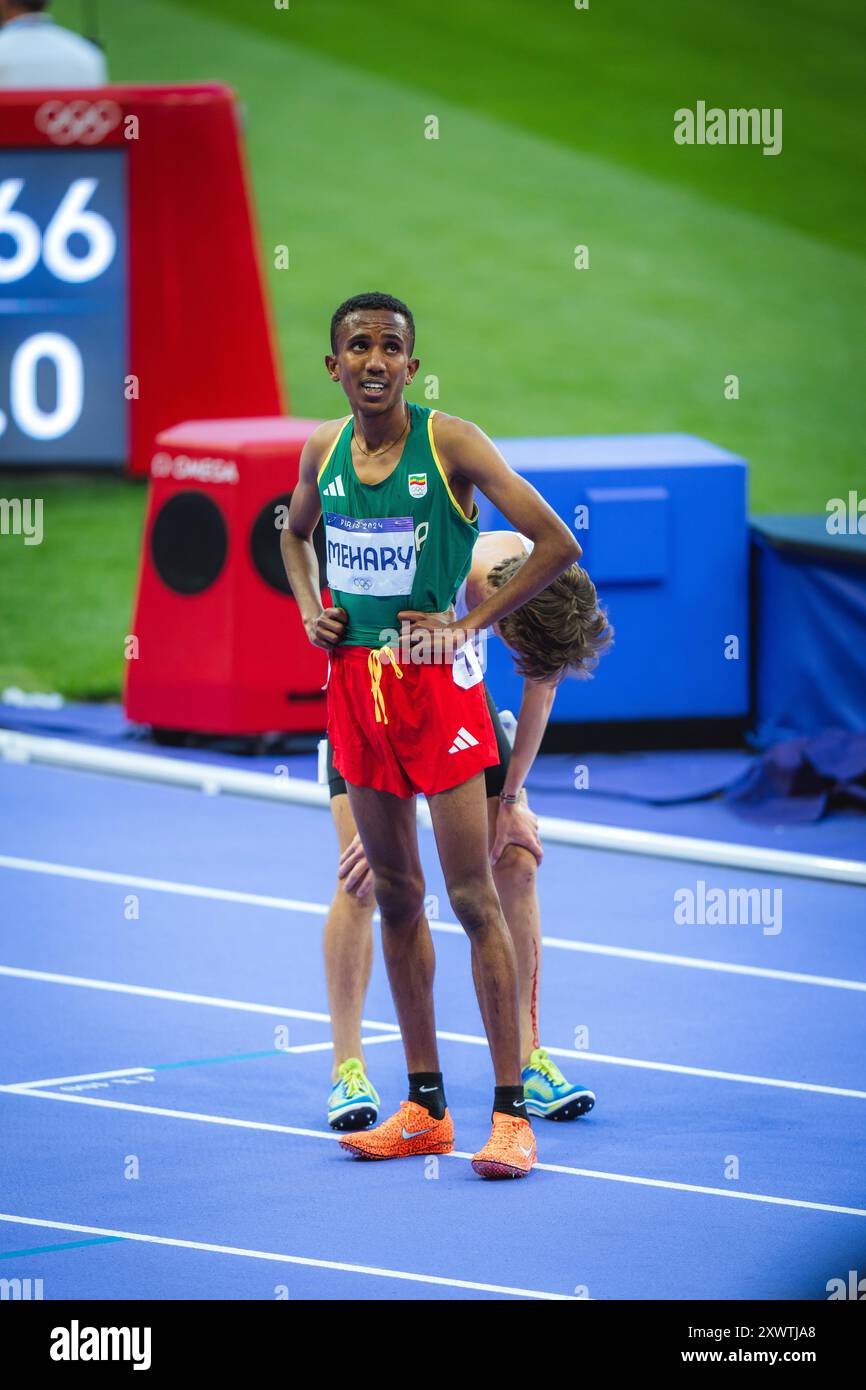 Biniam Mehary participating in the 5000 meters at the Paris 2024 ...