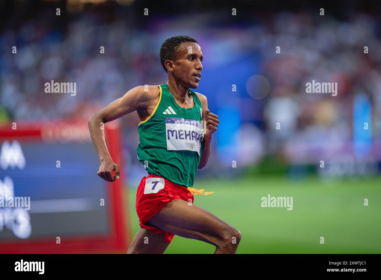 Biniam Mehary participating in the 5000 meters at the Paris 2024 ...