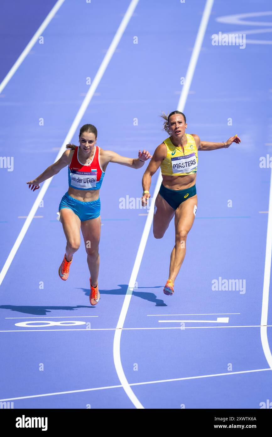 Bree Masters participating in the 100 meters at the Paris 2024 Olympic ...