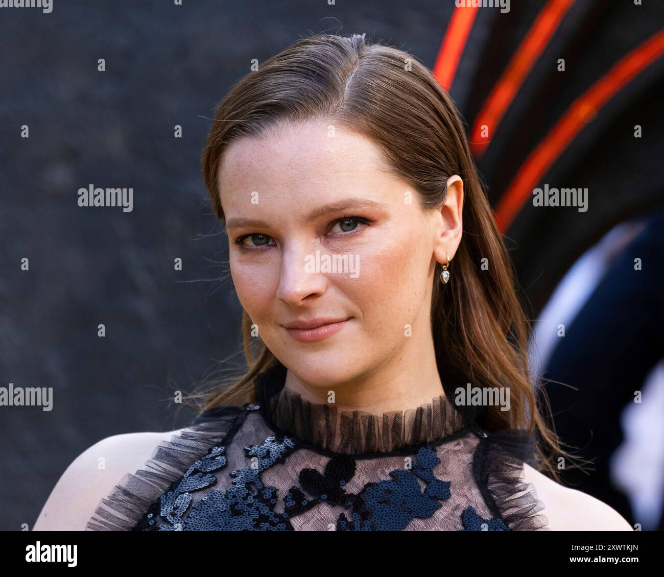 Morfydd Clark poses for photographers upon arrival at the World ...