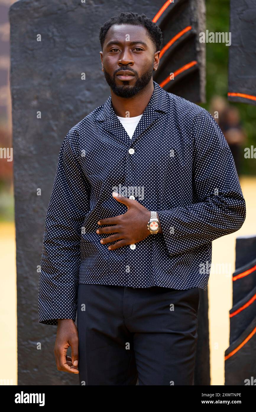 Aaron Shosanya poses for photographers upon arrival at the World ...