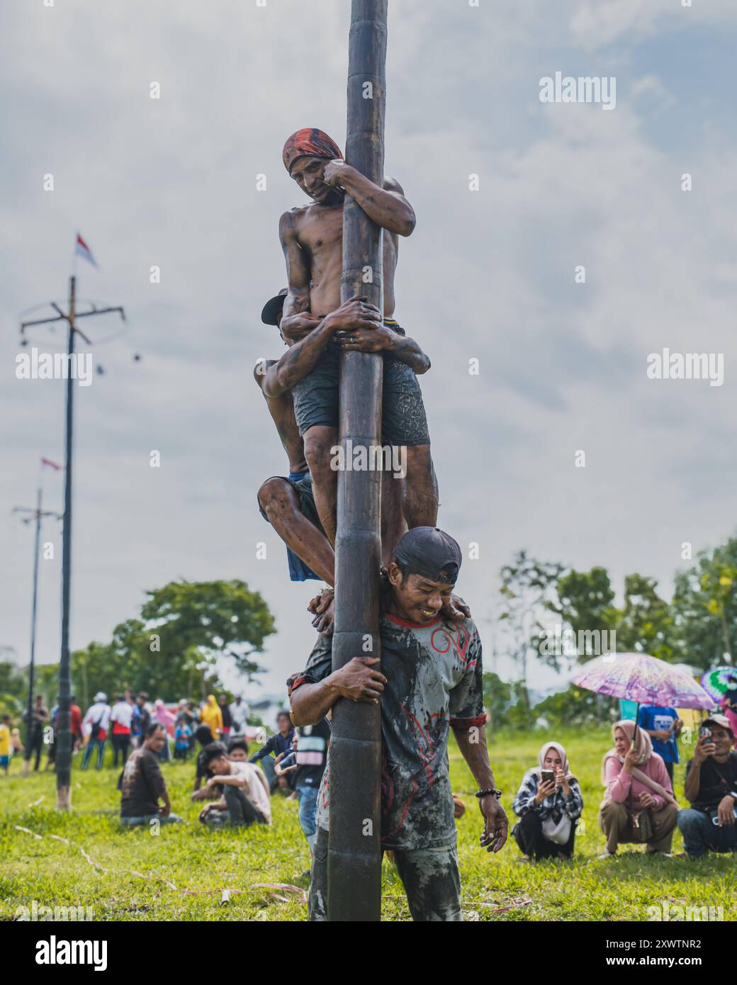 Balikpapan, Indonesia - August 18th, 2024. They are climbing the Betel ...