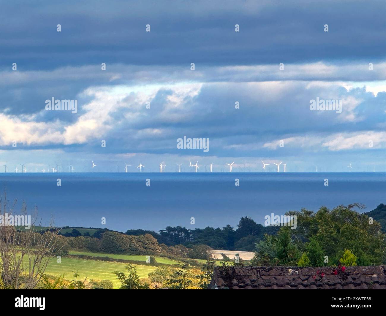 Wind farm on the English coast viewed from Onchan on the Isle of Man ...