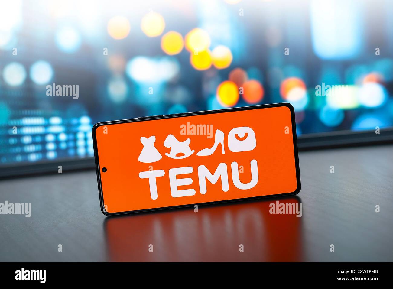 In this photo illustration, the Temu logo is displayed on a smartphone ...