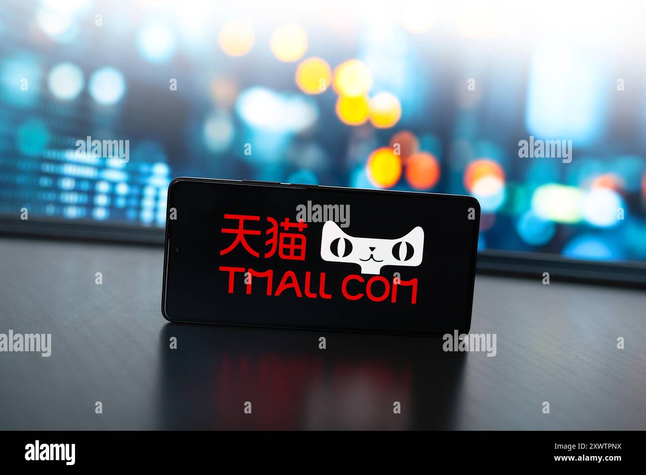 In this photo illustration, the Tmall logo is displayed on a smartphone ...