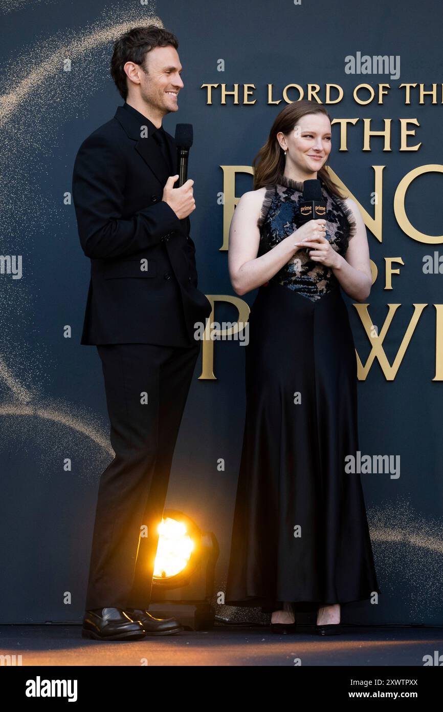 Charlie Vickers, left, and Morfydd Clark pose for photographers upon ...