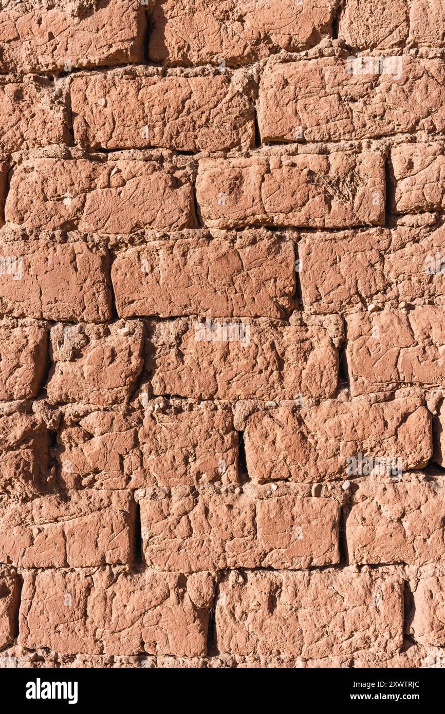 Texture of earth and adobe wall with cracks and grooves in the Andes ...