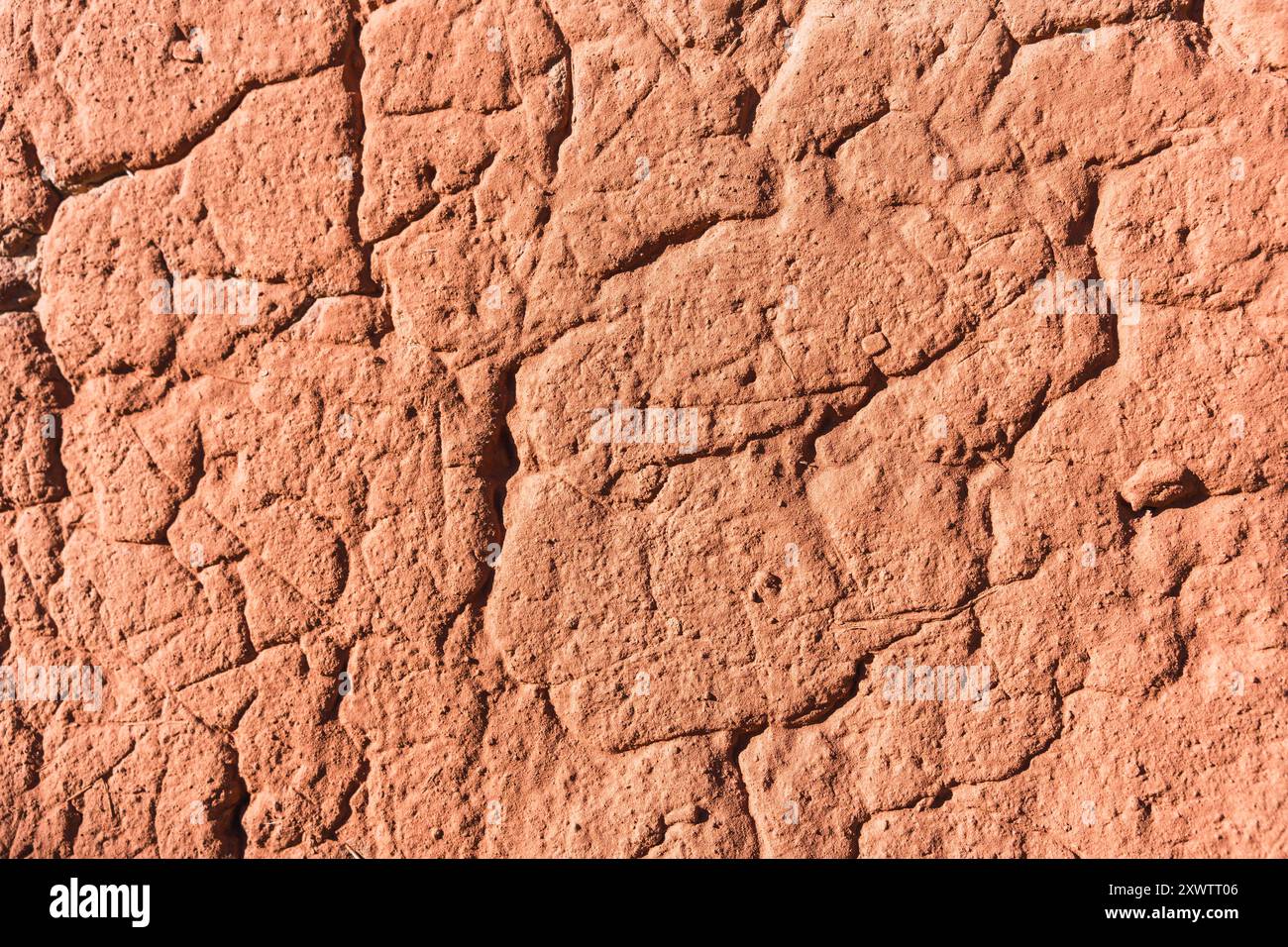 Texture of earth and adobe wall with cracks and grooves in the Andes ...