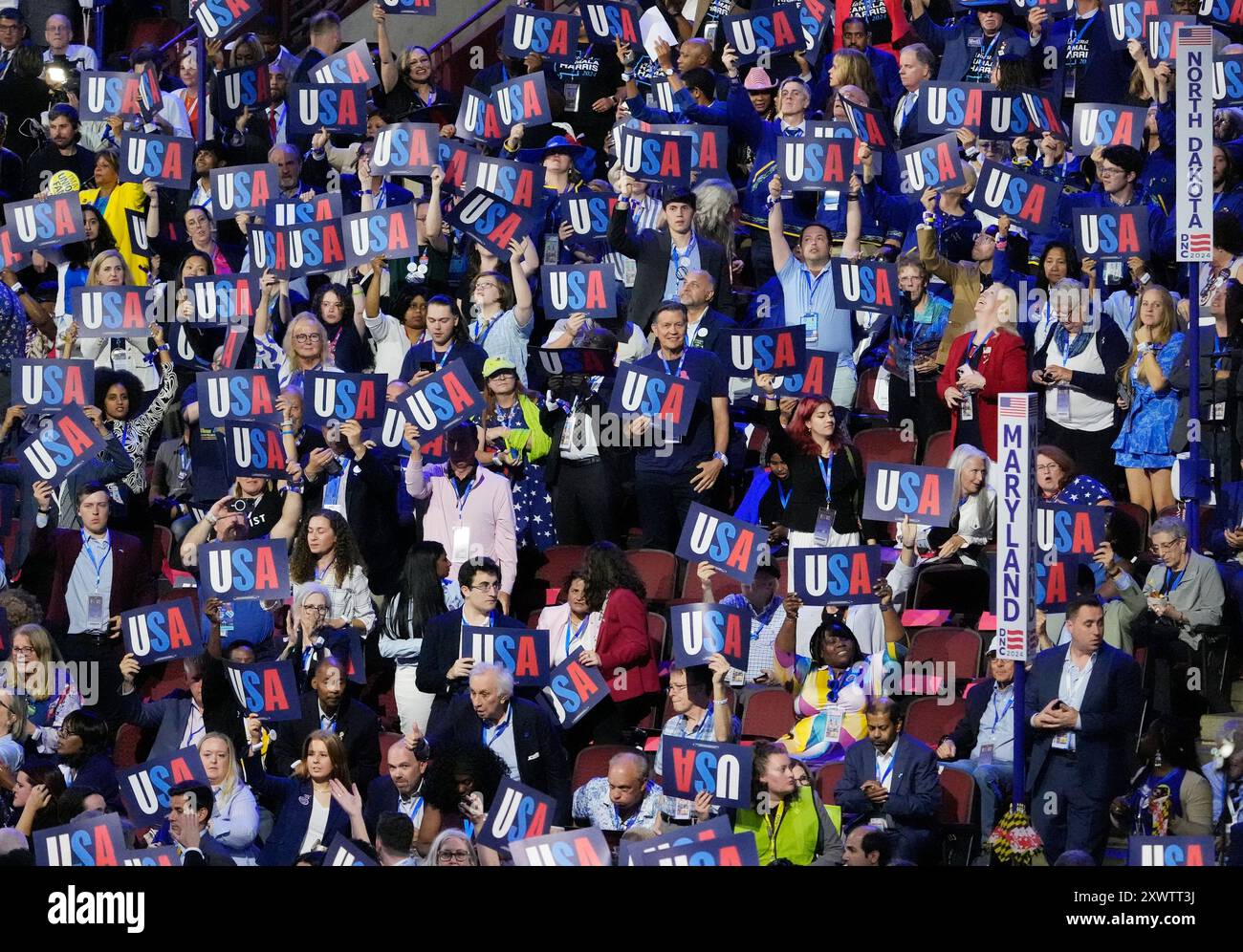 Chicago, United States. 20th Aug, 2024. Delegates hold USA signs at the ...