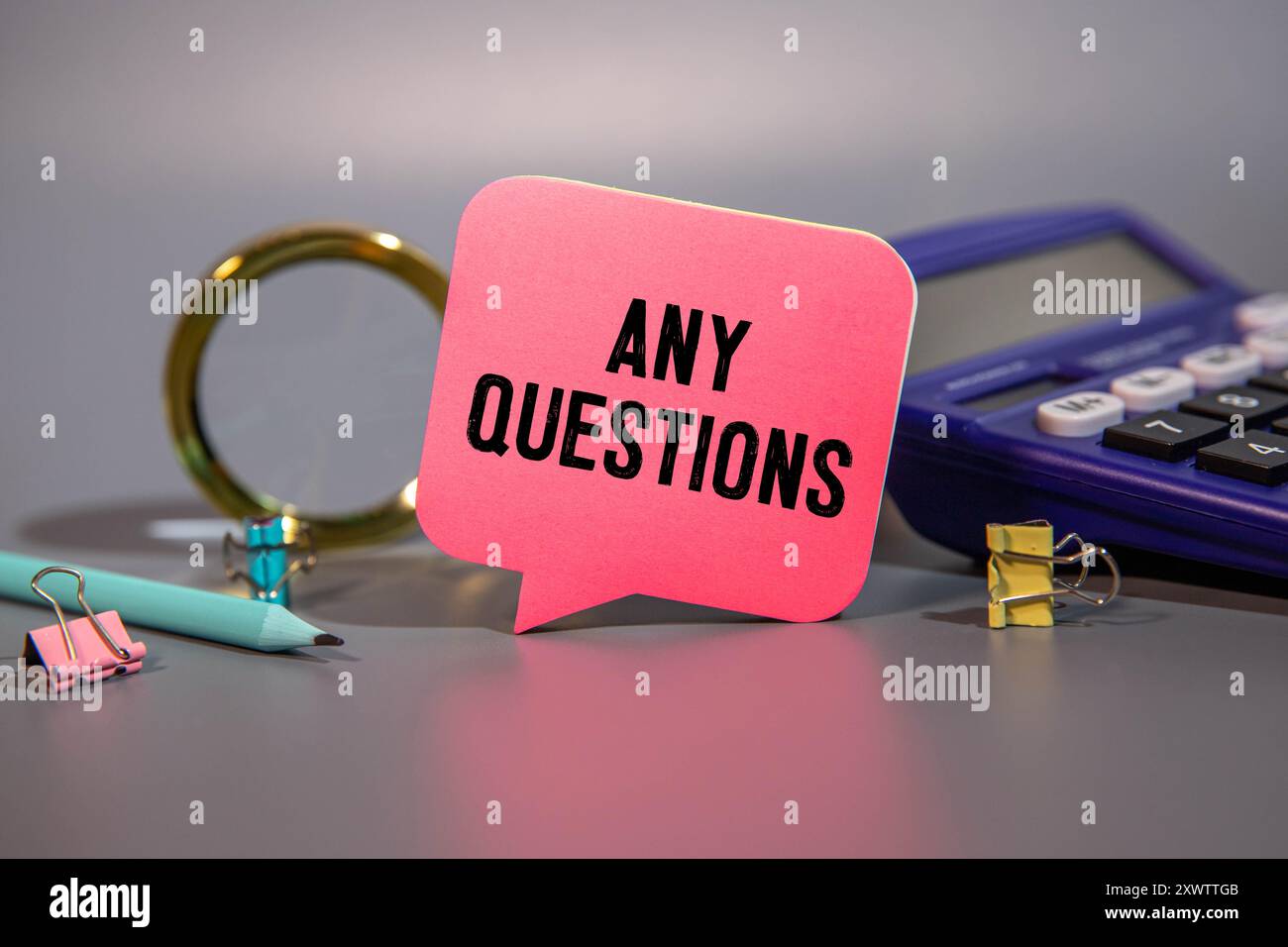 Notepad with text Any Question. on yellow background Stock Photo - Alamy