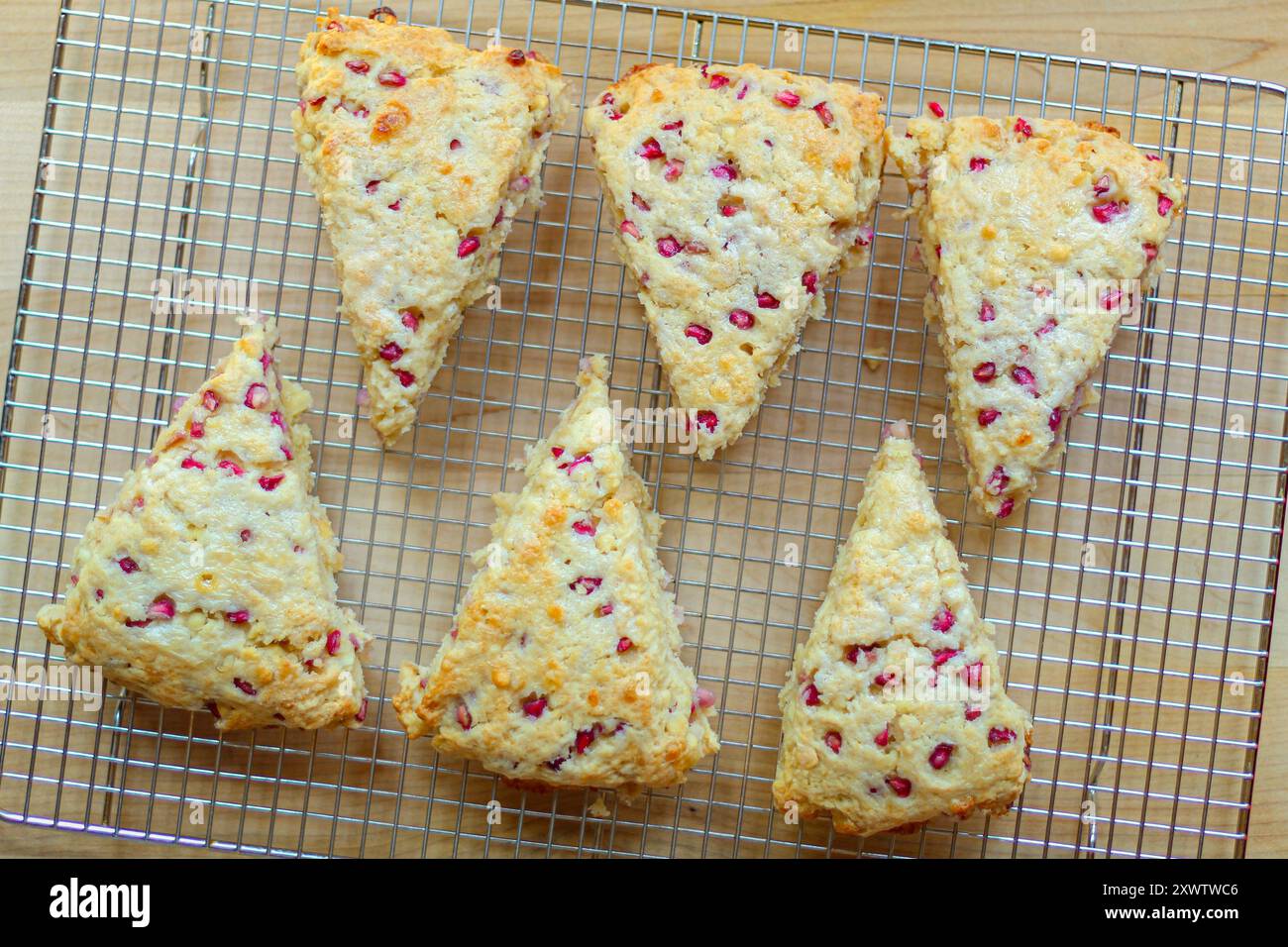 Homemade pomegranate scones on wire rack Stock Photo - Alamy