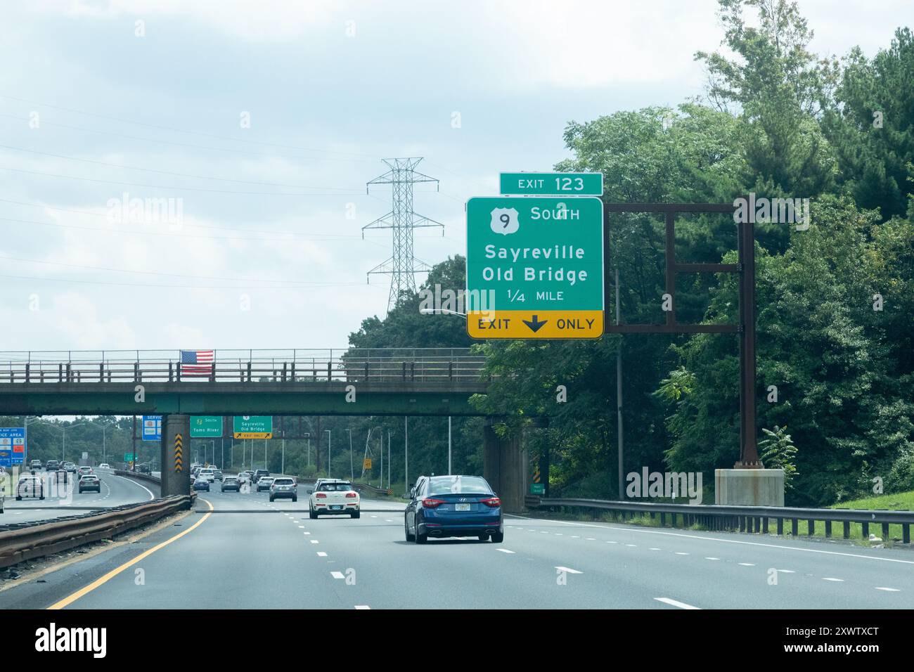 South Amboy, New Jersey - August 18, 2024: A sign on the Garden State Parkway tells drivers to ...