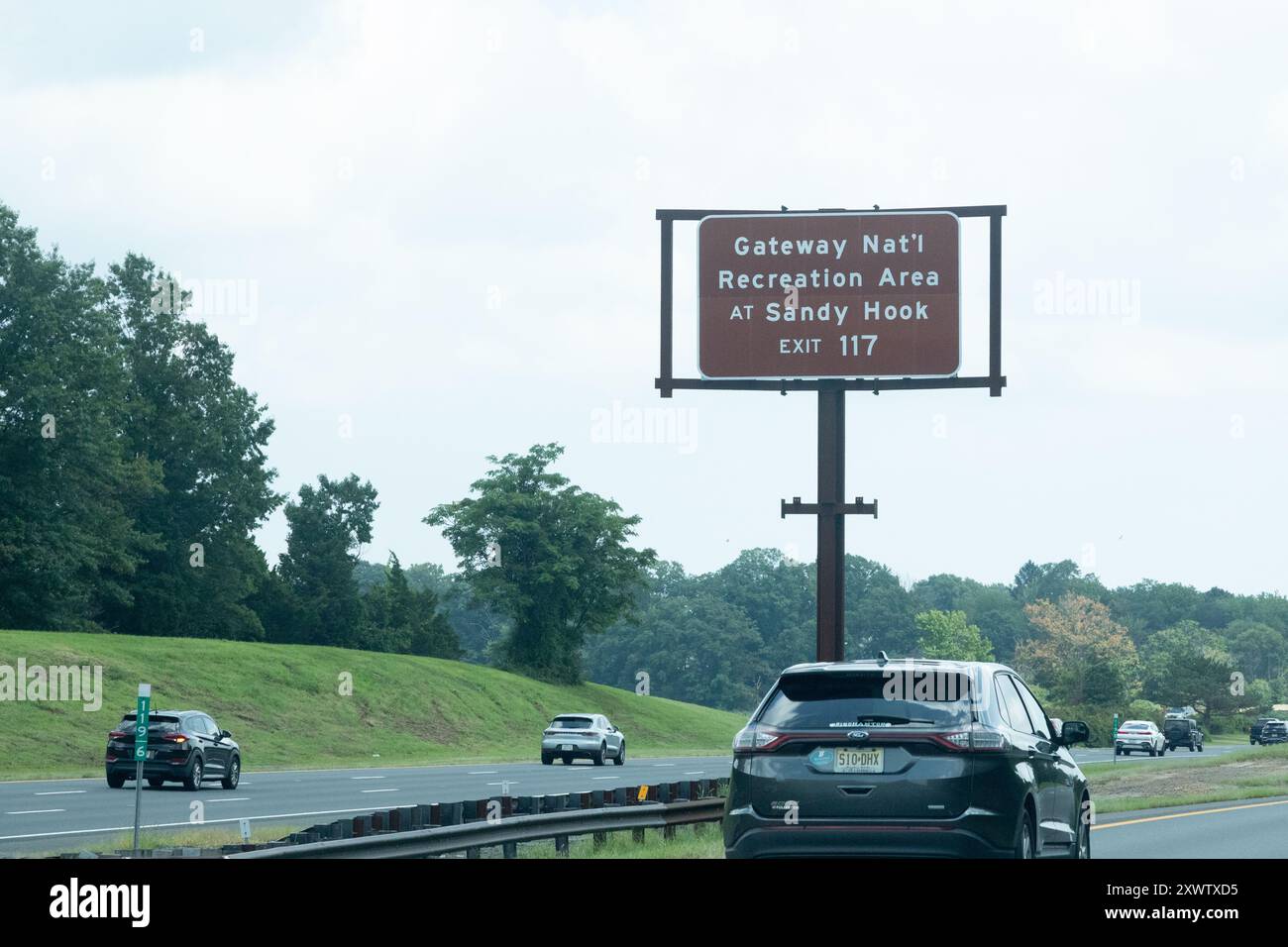 Aberdeen, New Jersey - August 18, 2024: A sign tells drivers to take ...