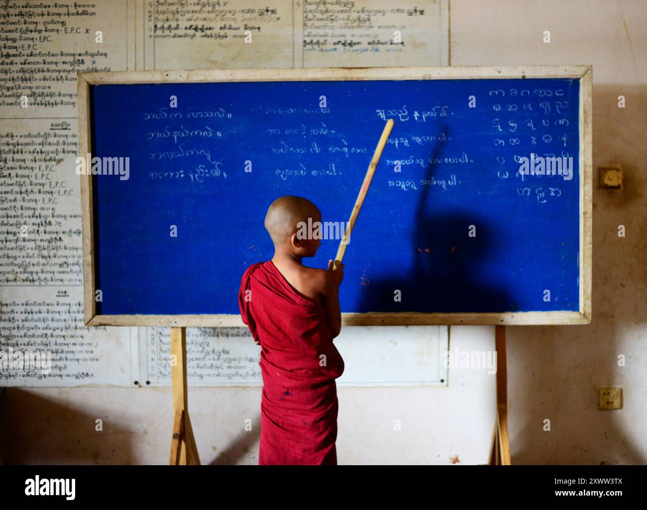 A young Buddhist monk in his classroom. Kengtung, Shan state, Myanmar ...