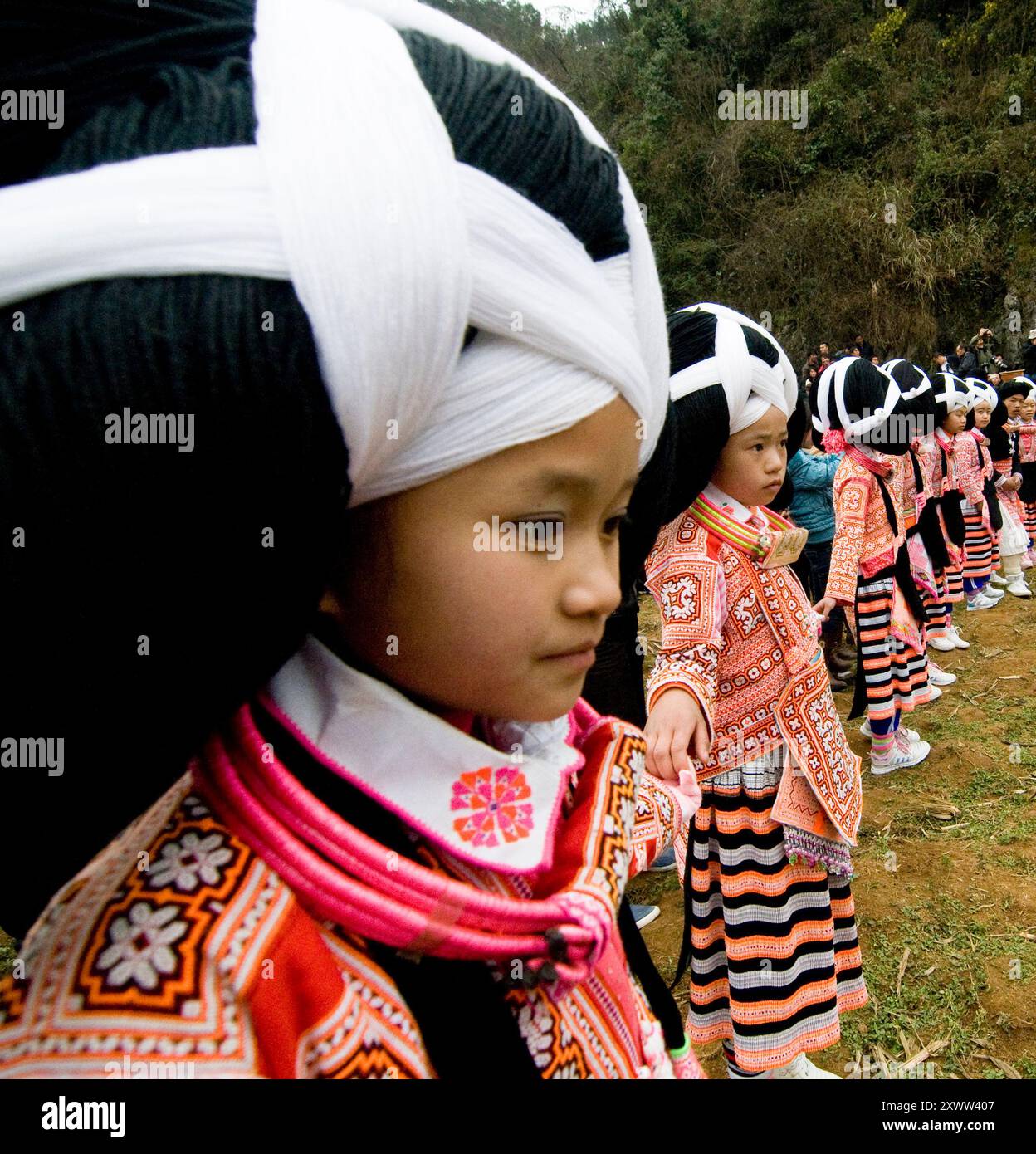 Long Horn Miao Teenagers in traditional costumes during the Tiao Hua ...