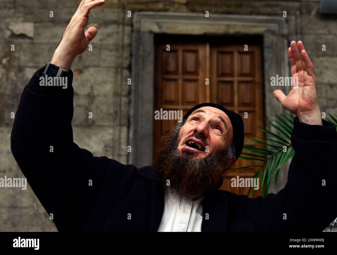 A Turkish man crying Inshalla in a mosque in Istanbul, Türkiye Stock ...