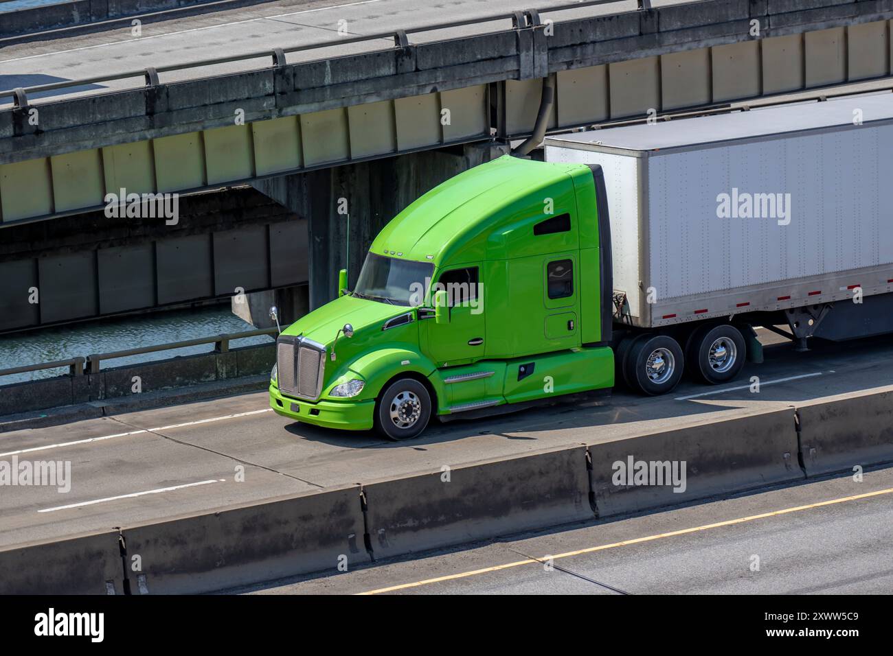 Green long haul big rig semi truck with extended cab for truck driver ...