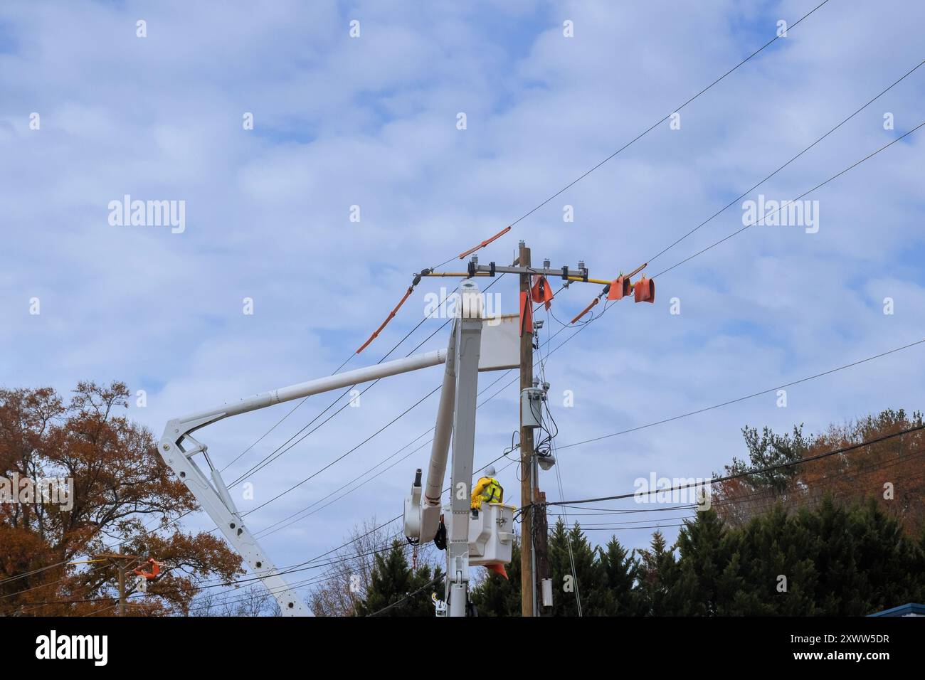 Lineman electrician engineer use insulated equipment working climbing ...