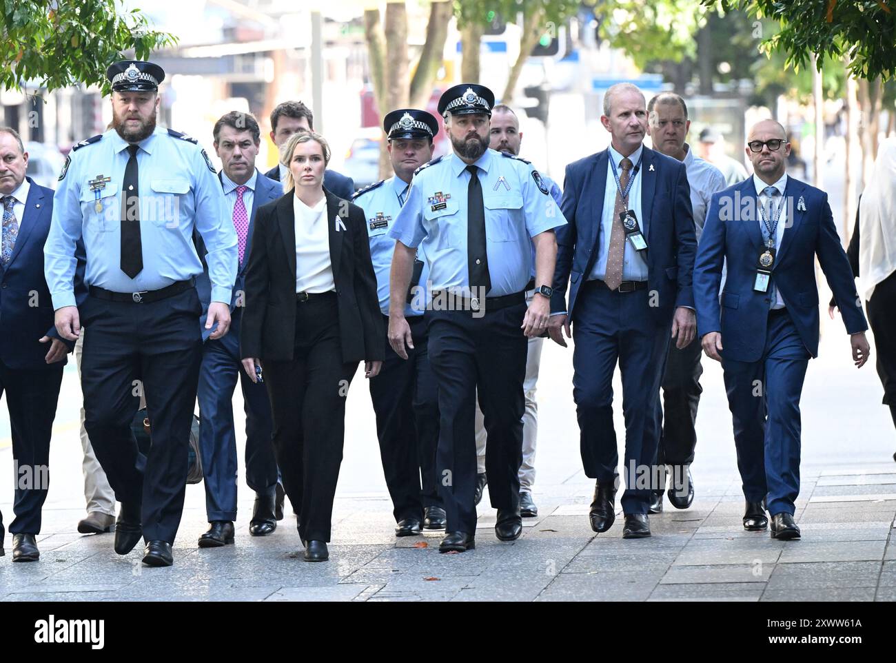 Brisbane, Australia . 21st Aug, 2024. (Left to right front) Senior ...