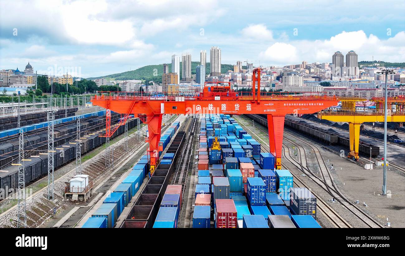 Harbin. 7th Aug, 2024. An aerial drone photo shows containers being ...