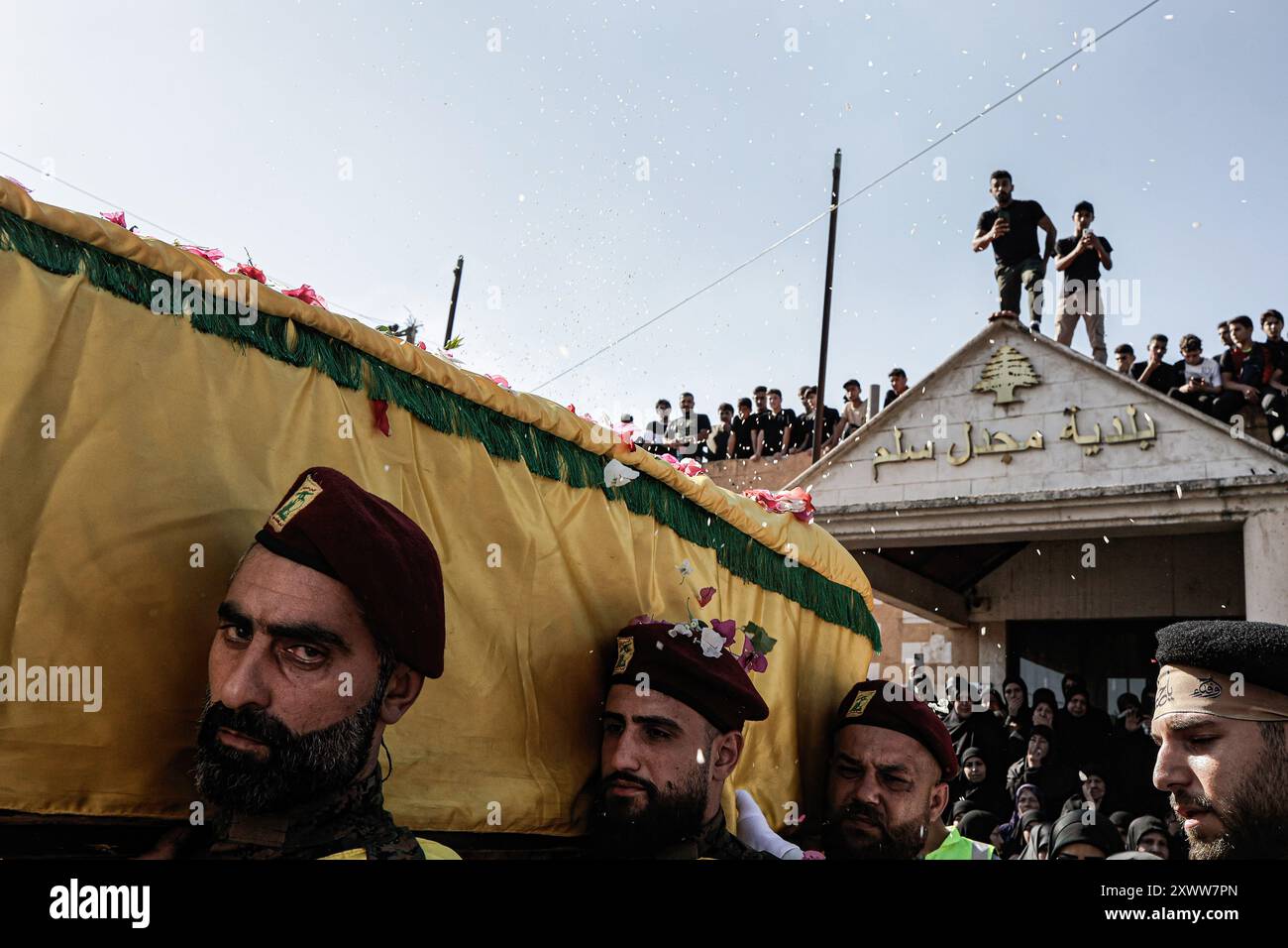 Majdal Slim, Lebanon. 20th Aug, 2024. Mourners carry the coffin of ...