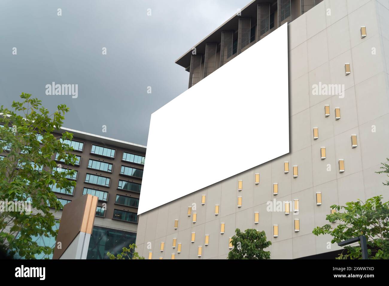 Empty white poster. Blank white billboard on the side of a tall ...