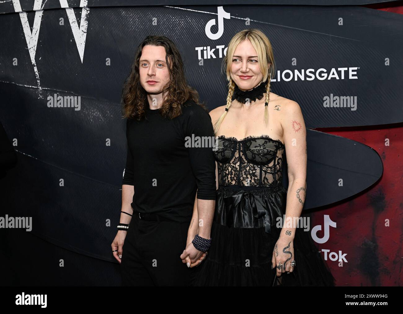 Rory Culkin, left, and wife Sarah Scrivener attend "The Crow" world ...